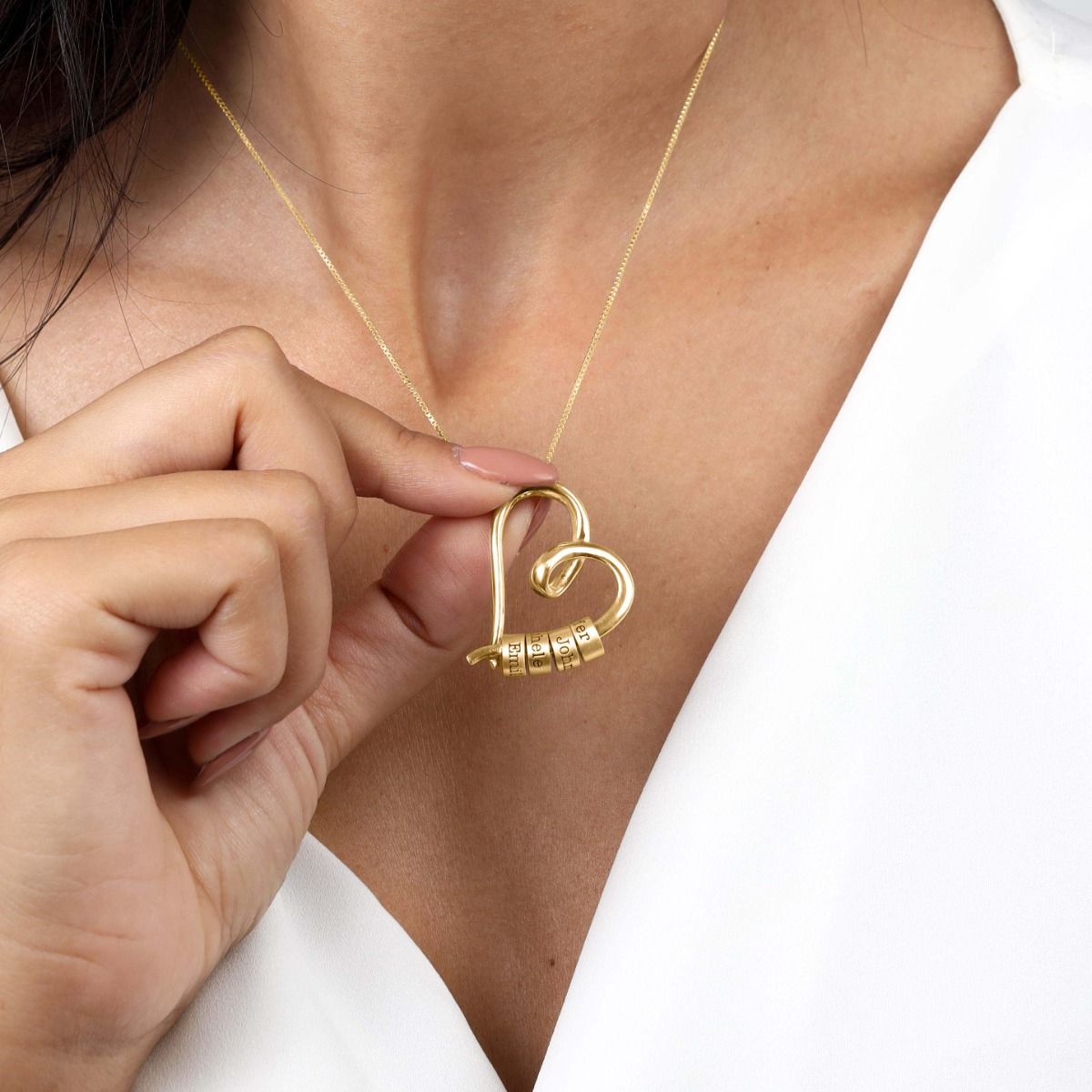 Gold heart pendant with name store